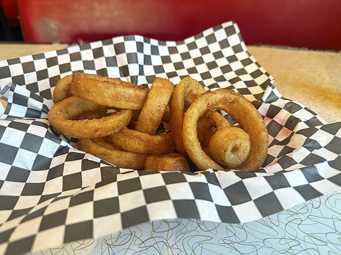 Onion rings with the perfect crunch-to-softness ratio—the kind that make you wonder why you ever waste calories on lesser versions.