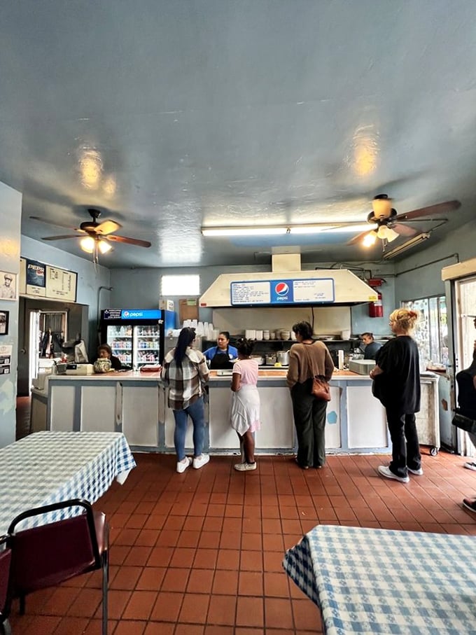 The ordering counter: where dreams come true and decisions get tough. The line moves with surprising efficiency—these folks have the process down to an art.