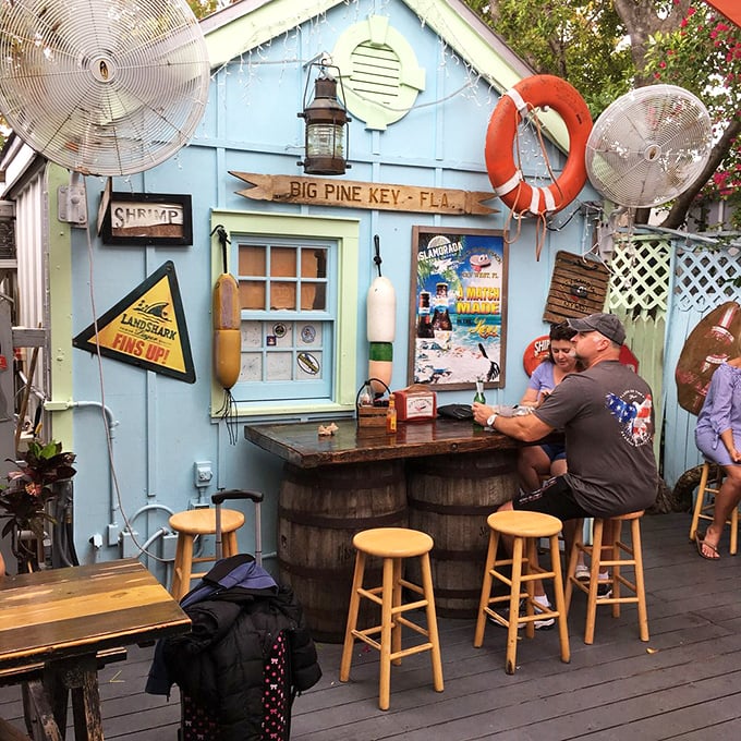 Old barrel tables and Florida blue walls create the perfect backdrop for seafood feasting. Jimmy Buffett would definitely approve.
