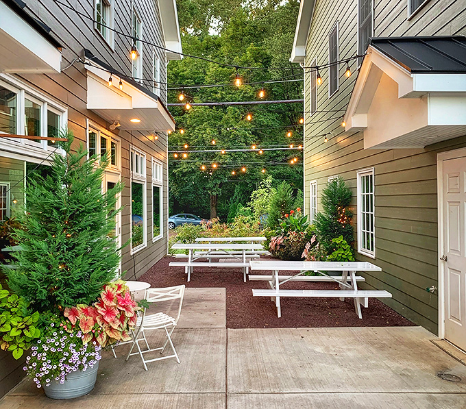 String lights transform this courtyard into an enchanted garden. Al fresco dining with a side of twinkle—summer evenings don't get better.
