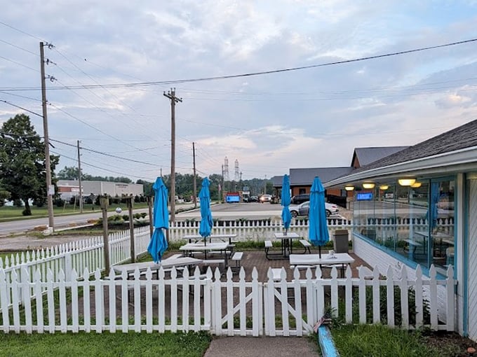 The outdoor patio doesn't just offer fresh air—it provides the perfect stage for enjoying comfort food while watching the world roll by.