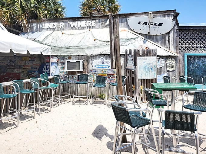 Sandy floors and salty air – the "Underwhere Bar" outdoor seating area feels like the beach came to dinner with you.