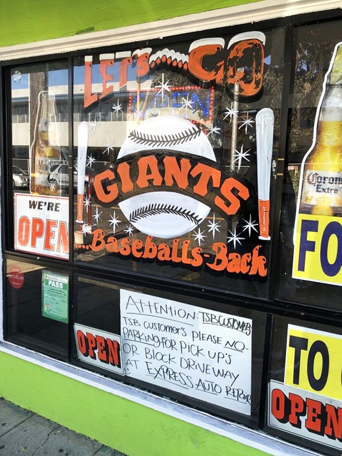 Even their window displays show local pride with Giants baseball love—proving great taquerias are as much neighborhood institutions as they are restaurants.