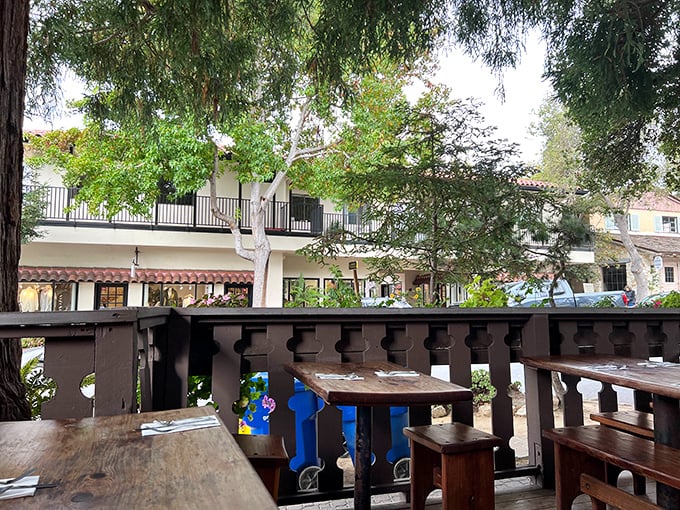 Outdoor seating surrounded by Carmel's lush greenery – where fresh air somehow makes everything taste even better.