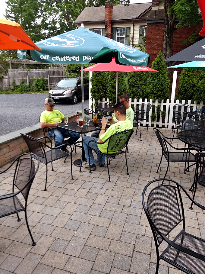 The outdoor patio—where fresh air enhances every sip and bite, proving that sometimes the best dining room has no walls at all.