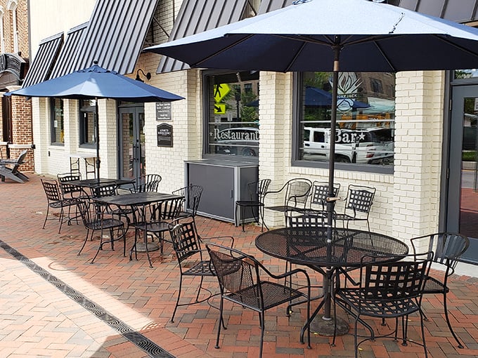 Outdoor seating where the brick-paved streets of Alpharetta provide the perfect backdrop for sauce-stained fingers and satisfied smiles.