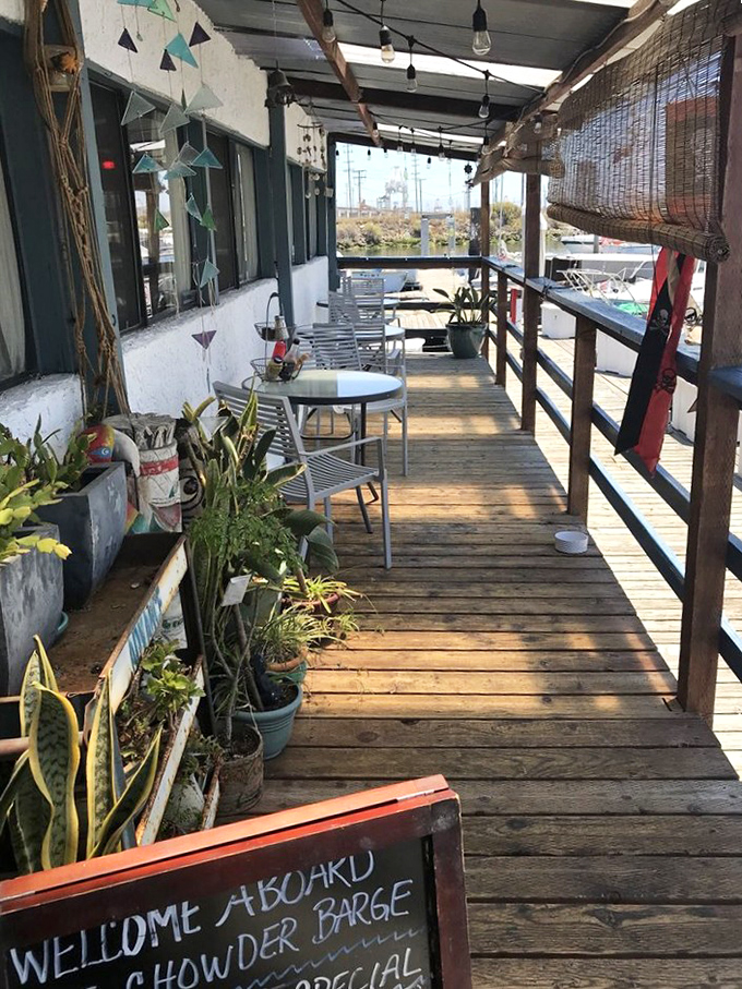 The outdoor deck offers marina views and sea breezes with your meal. Those potted plants? They've probably heard more sailor stories than most humans.