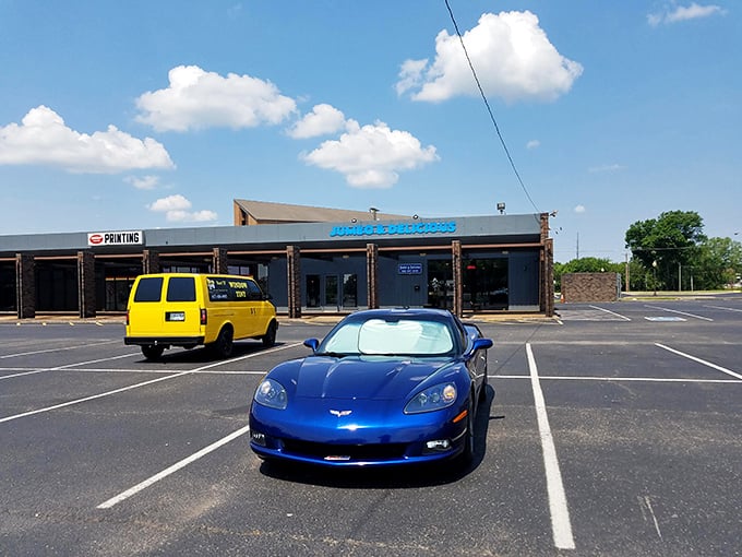 Even fancy cars need fantastic burgers. The diverse parking lot tells the story – good food is the great equalizer in American culture.