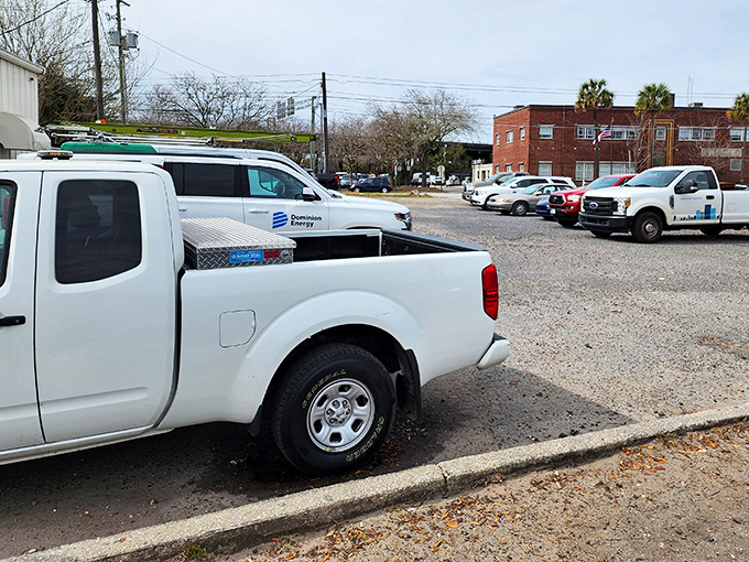 Even the parking lot tells a story—work trucks and family cars side by side, because great burgers are the ultimate equalizer.