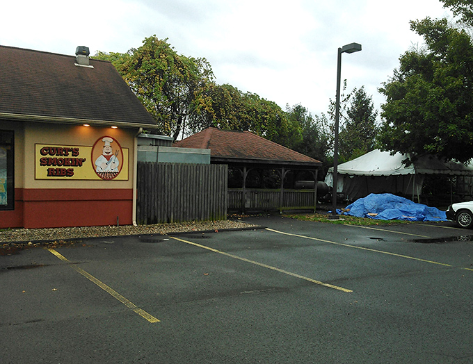 The unassuming parking lot doesn't hint at the flavor explosion waiting inside. Some of life's best surprises come in modest packages.