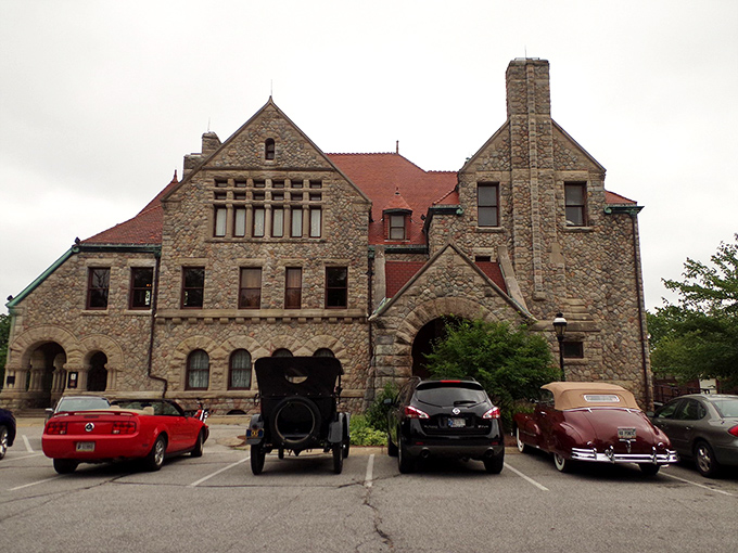 Even the parking lot hints at the treasures within – classic cars seem naturally drawn to timeless elegance.