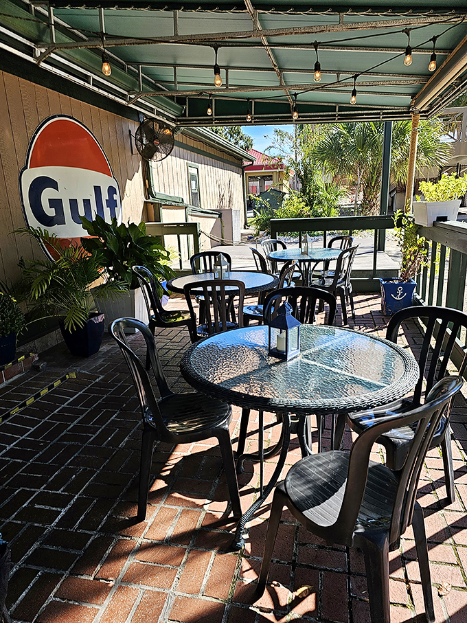 The patio says, "Stay awhile." Gulf memorabilia and Florida sunshine create the perfect setting for post-lobster roll contemplation.