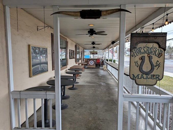 The front porch seating area offers a taste of old-time Western hospitality. Just imagine sipping bourbon here while waiting for your table.