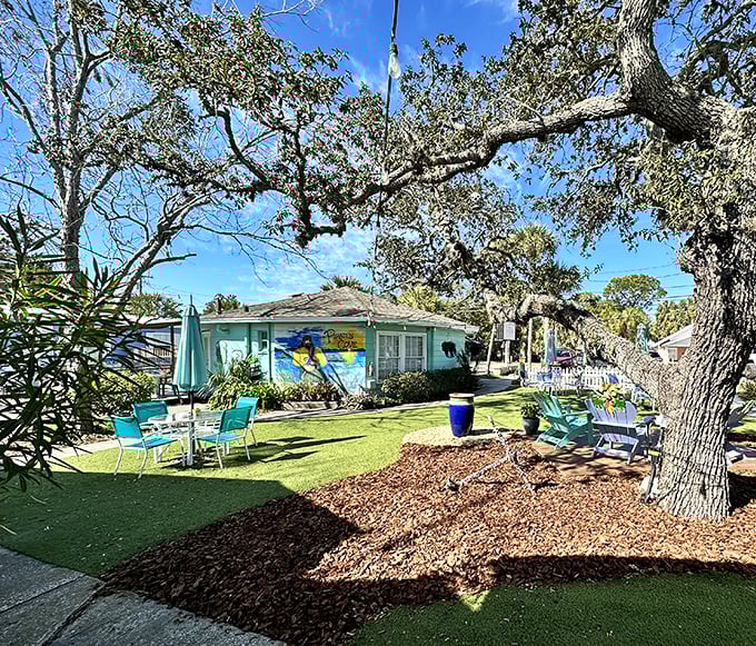 Coastal cottages with character – this colorful home with its shaded yard offers the kind of authentic Florida living that glossy brochures can't capture.