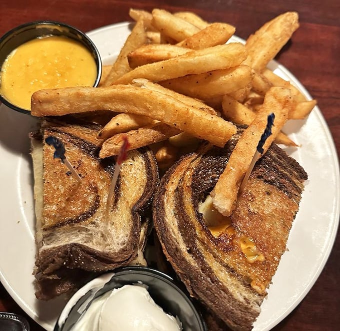 This Reuben isn't just a sandwich; it's a masterclass in contrast—warm, cool, crunchy, soft, tangy, rich. The Switzerland of sandwiches: perfectly neutral yet exceptional.
