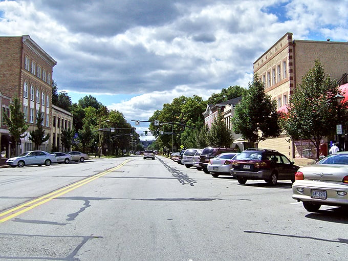 Main Street stretches before you like a runway of small-town possibility, where brick buildings stand shoulder to shoulder in a display of architectural solidarity.