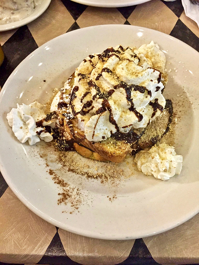 S'mores French toast that makes camping optional. All the nostalgia of fireside treats with the bonus of not smelling like smoke for three days.