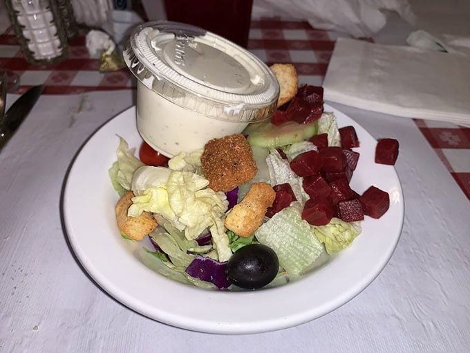 This isn't just a salad – it's a supporting actor that knows its role perfectly, providing crisp contrast to the hearty main attractions without stealing the spotlight.