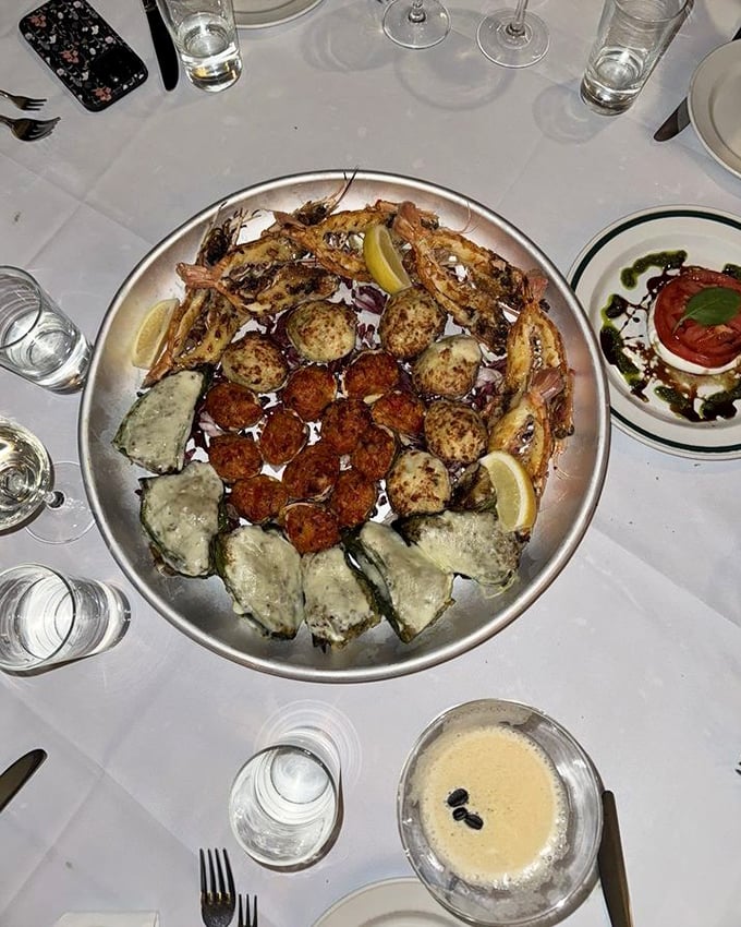 A seafood sampler that turns your table into the Mediterranean's greatest hits album. The caprese salad on the side isn't jealous—it knows its worth.