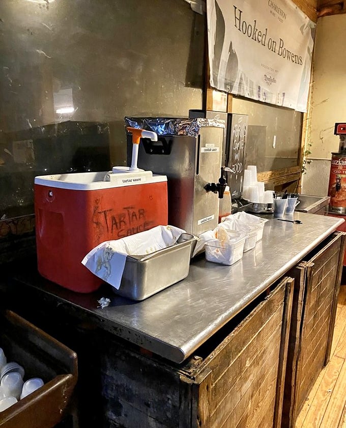 The condiment station – where tartar sauce is considered essential infrastructure and cocktail sauce is customized to your heat preference.