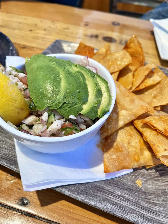 Ceviche that dances with lime and avocado—a cool, refreshing reminder that sometimes the best cooking happens without heat.