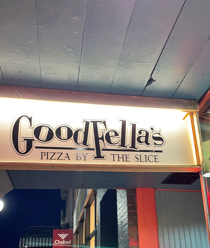 The illuminated Goodfellas sign – a symbol of hope and deliciousness in downtown Athens.