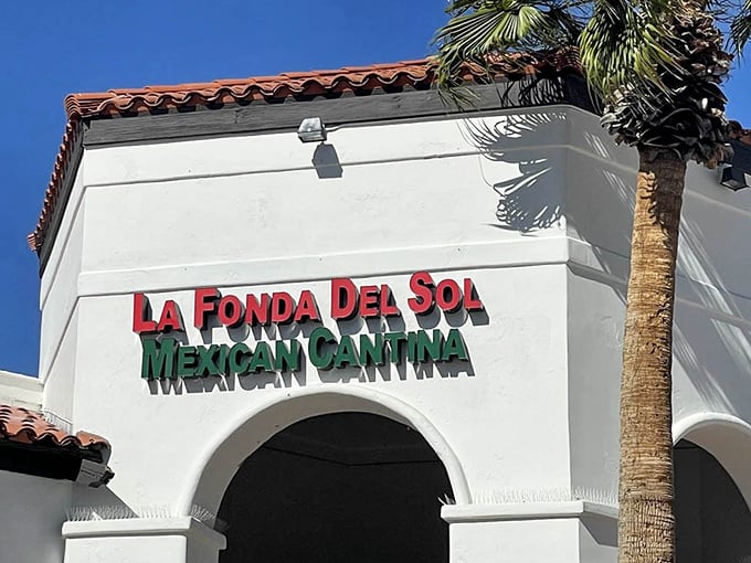 The sign says "Mexican Cantina" but might as well read "Happiness Headquarters." That palm tree isn't just decoration—it's setting expectations.