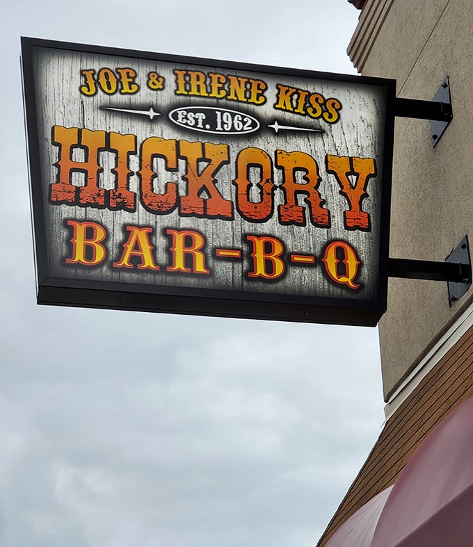 "Joe & Irene Kiss Est. 1962"—a sign that tells you this place has history, character, and owners who actually exist. No focus groups created this brand.