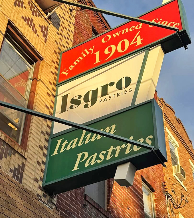 The sign says it all—family-owned since 1904. In a world of corporate chains and trendy pop-ups, Isgro remains steadfastly, deliciously authentic.