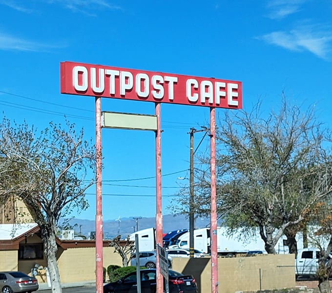 That classic roadside sign promising good food ahead – sometimes the best adventures start with simple promises.