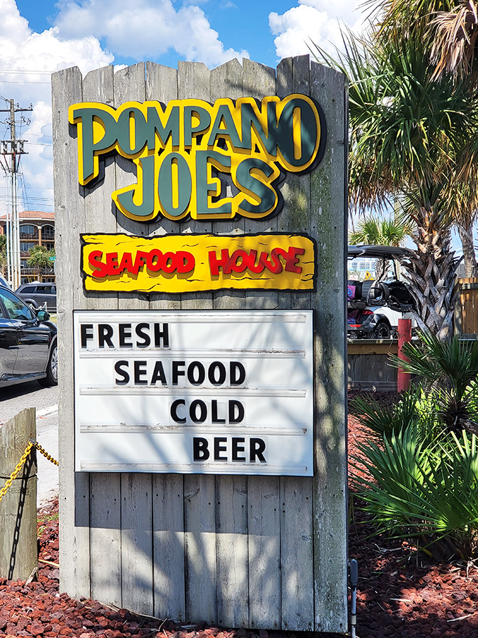 The sign says it all: "Fresh Seafood, Cold Beer"—a six-word poem that perfectly captures the essence of beachside dining in Destin.