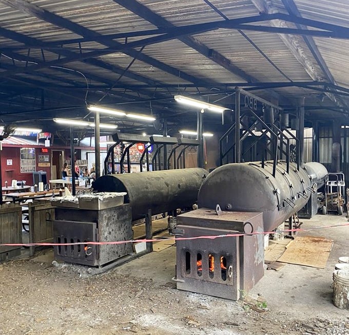 The massive smokers – industrial-sized metal beasts where the alchemy of smoke, meat, and time creates edible magic worth driving hours for.