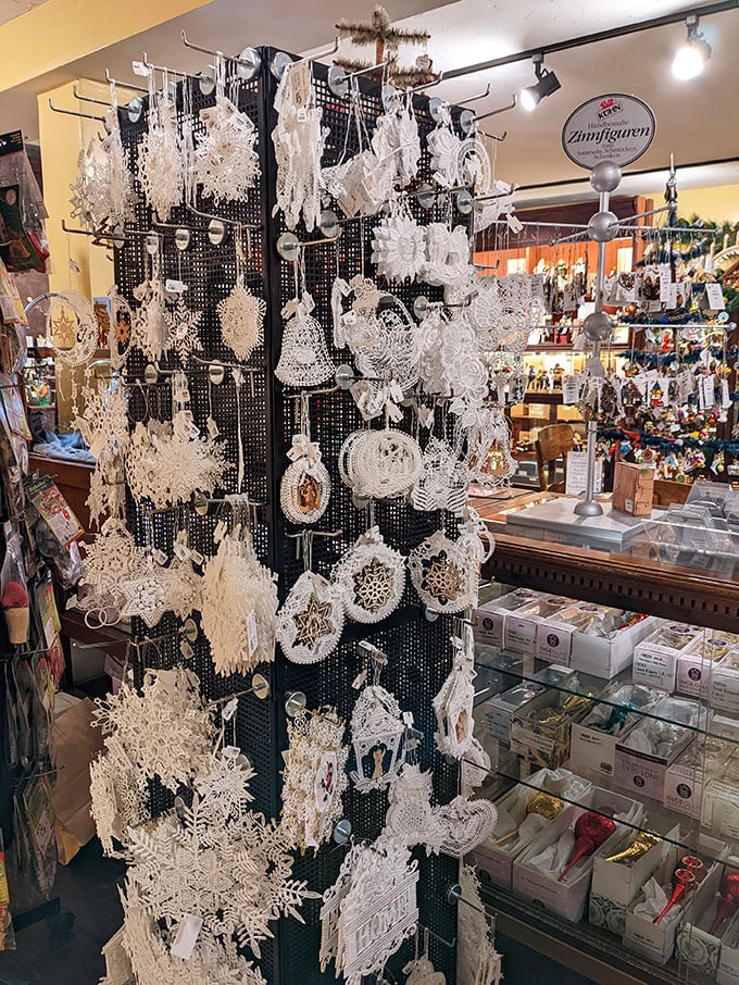 Delicate white lace ornaments hang like frozen moments of winter—snowflakes captured in thread instead of crystallized water.