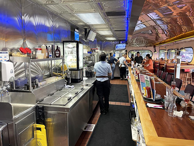 Behind the scenes, the real stars make movie magic happen—the kitchen crew orchestrates breakfast symphonies in their stainless steel domain.