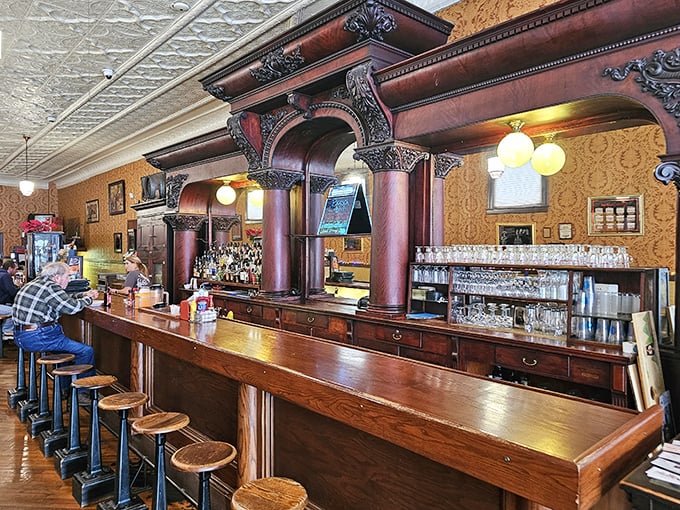 The magnificent back bar with its polished wood and classic details—a reminder of when craftsmanship mattered and bars were the heart of community.