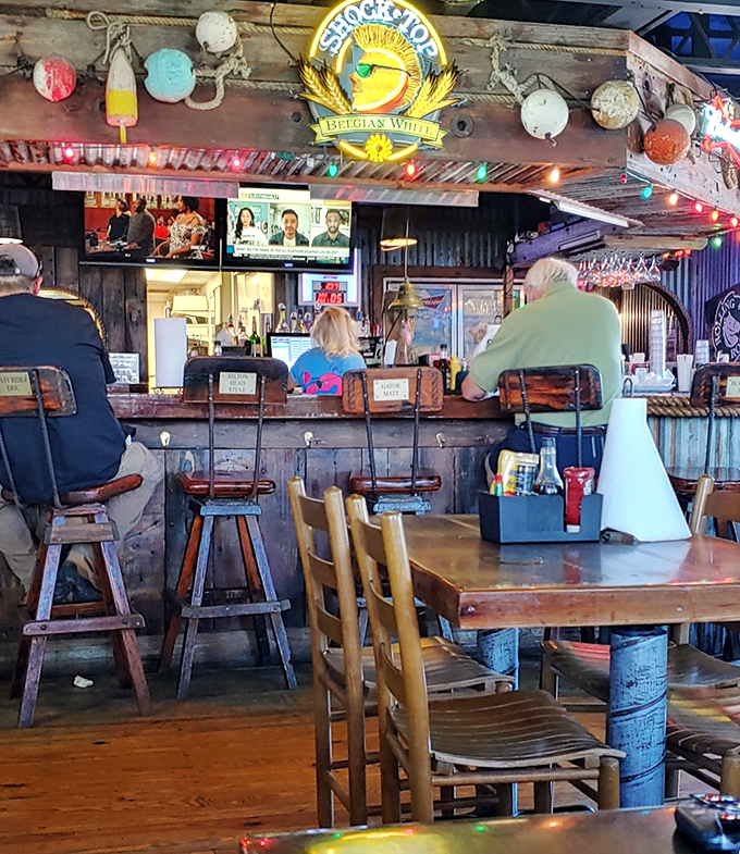 The neon Corona sign isn't just advertising—it's a lighthouse guiding thirsty travelers to a safe harbor of cold beverages.