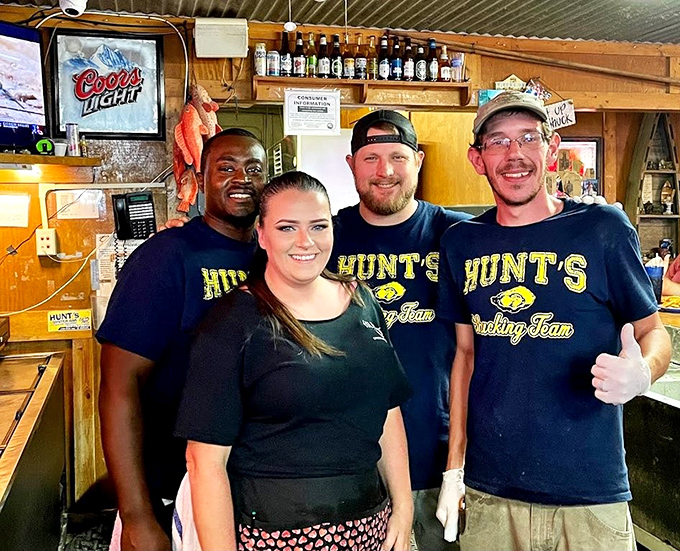The shucking team at Hunt's isn't just staff—they're seafood artists with the skills to match their smiles. Their hands move faster than your hunger.