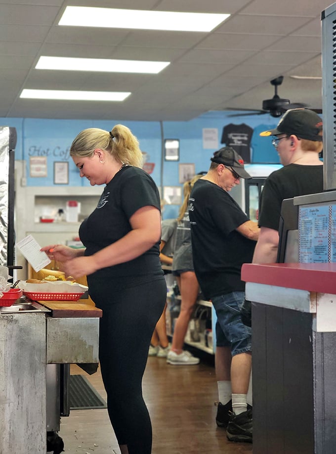 The unsung heroes of comfort food, working their magic behind the scenes. These aren't just cooks—they're memory makers in aprons.
