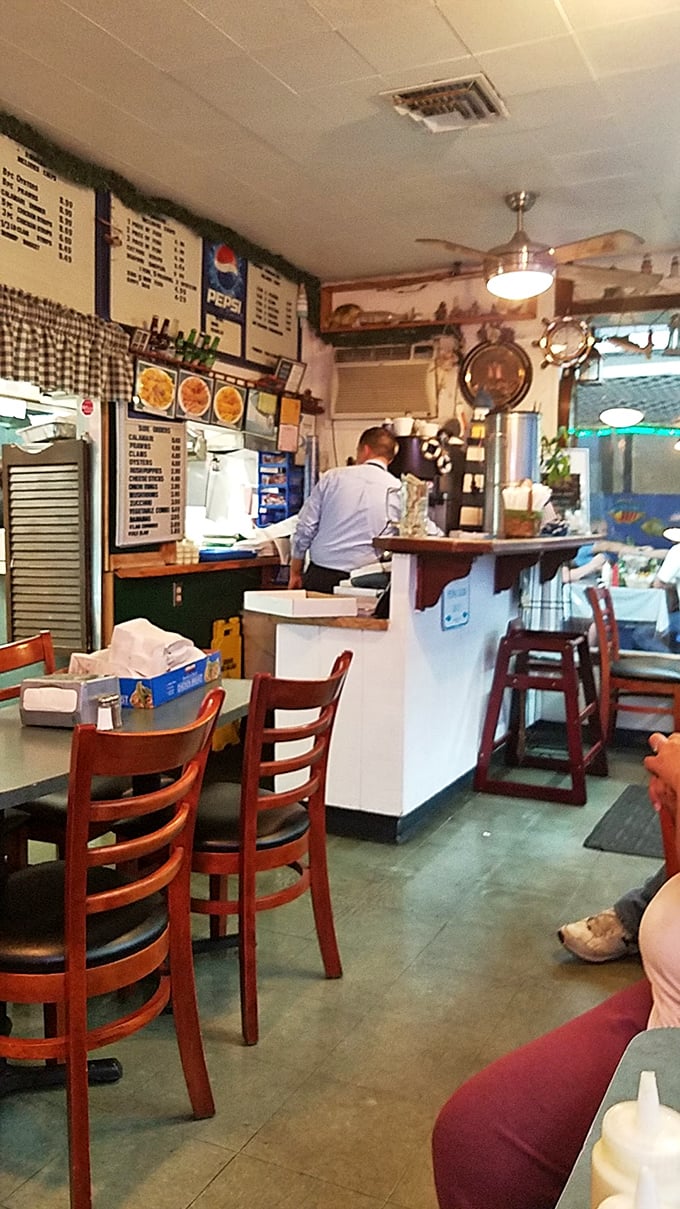 The kitchen staff moves with the practiced efficiency of people who know exactly what they're doing. That focus is why your food always arrives perfect.