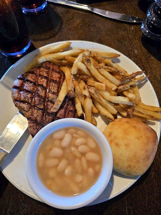 A perfectly grilled steak proves Catfish House isn't just about seafood. Those grill marks tell you everything you need to know.