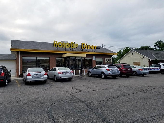 Rain or shine, the Honey Dip stands ready to serve. That parking lot has welcomed generations of hungry Ohioans seeking comfort food salvation.
