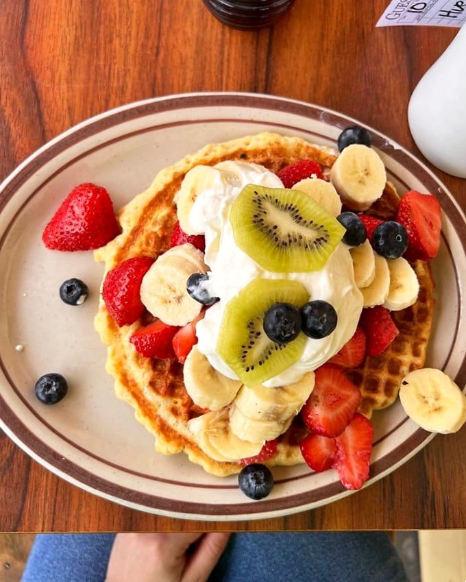 A waffle that's basically a fruit delivery system. Fresh berries, bananas, and kiwi make this almost – almost – too pretty to eat.