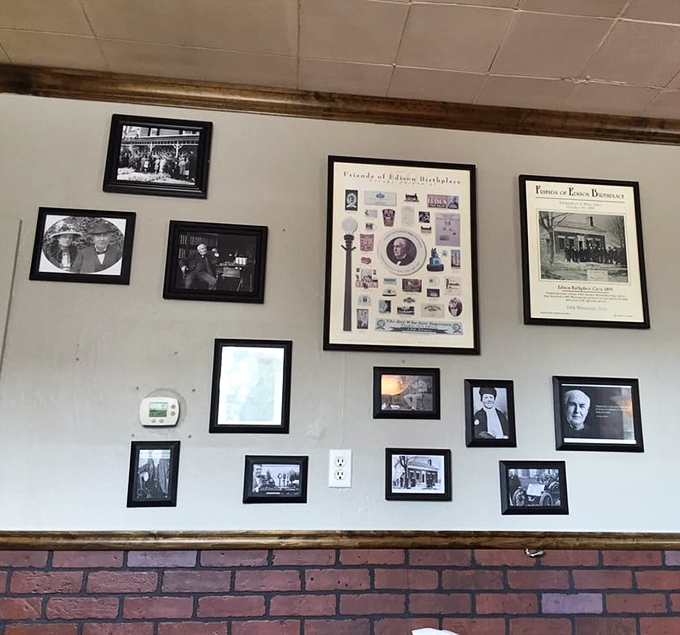 The wall gallery serves as Milan's unofficial history museum, where Edison watches over diners like a proud parent at a particularly delicious graduation ceremony.