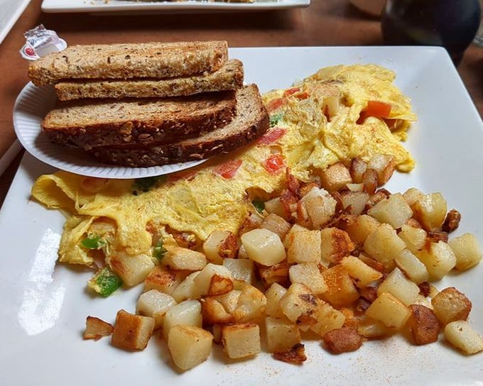 An omelet that's seen more action than an Indiana Jones movie, packed with peppers, potatoes, and possibilities.