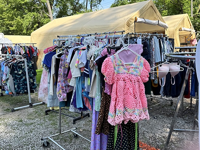 Clothing racks bursting with possibility—that pink crochet dress might be someone's future vintage find in another thirty years.