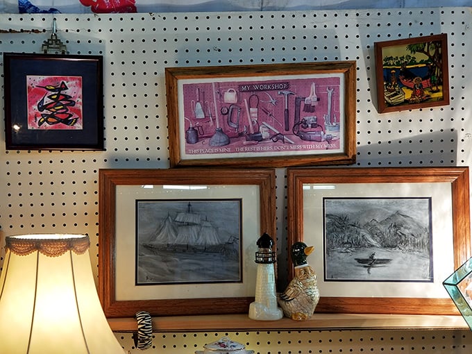 Framed artwork ranges from nautical sketches to workshop wisdom, each piece once carefully selected to make a house feel like home.
