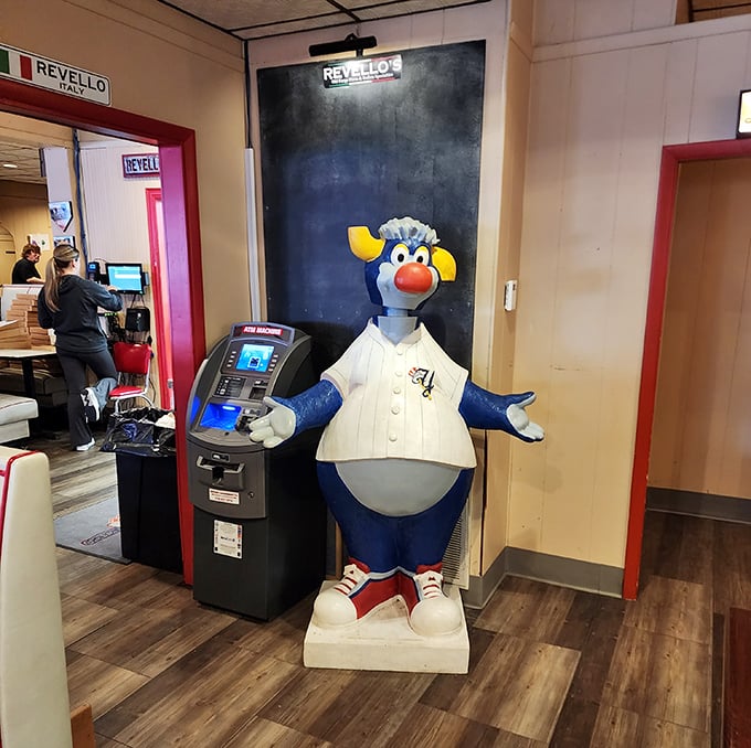 Even the whimsical chef statue seems to be saying, "Just wait until you taste what's coming out of our kitchen!"