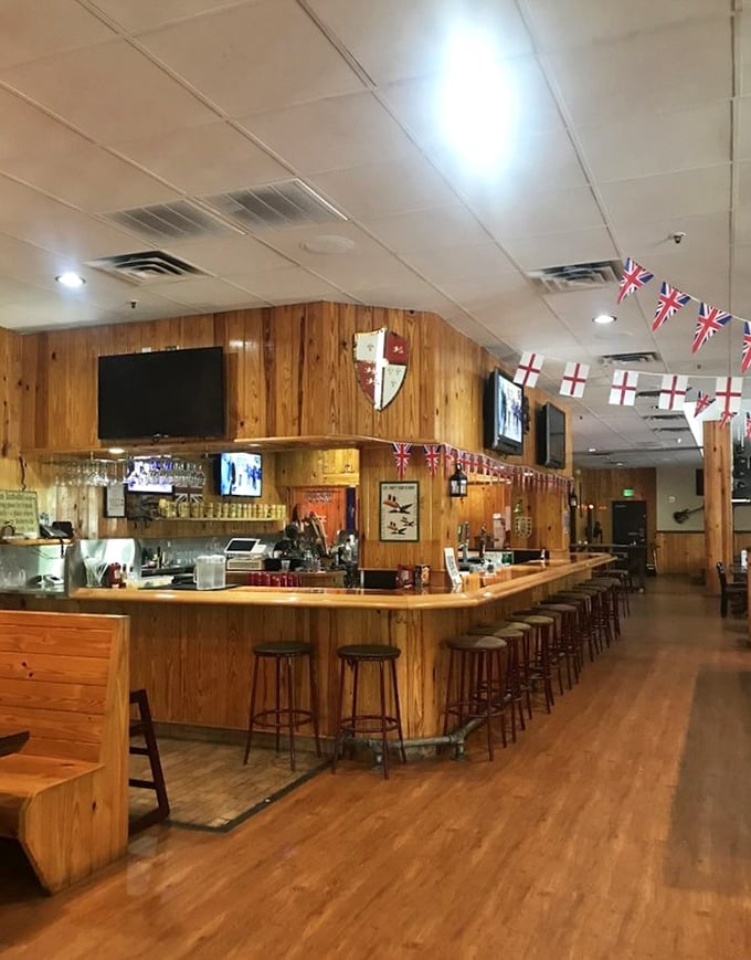 Union Jack bunting above the bar—a gentle reminder that you're about to make some very British decisions about your beverage.