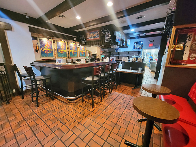 The bar area promises properly made margaritas and cold cervezas—essential companions to those legendary enchiladas.