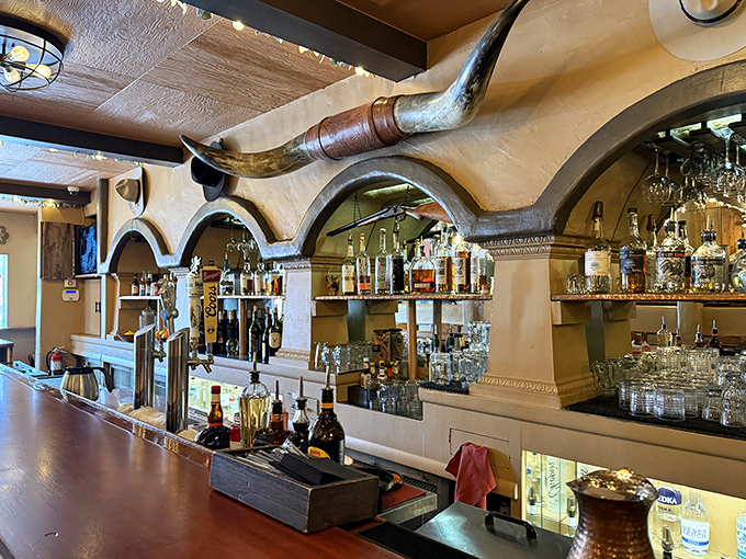 The bar where longhorn meets long drinks. That massive horn overhead isn't just decoration—it's a conversation starter that's witnessed countless toasts.